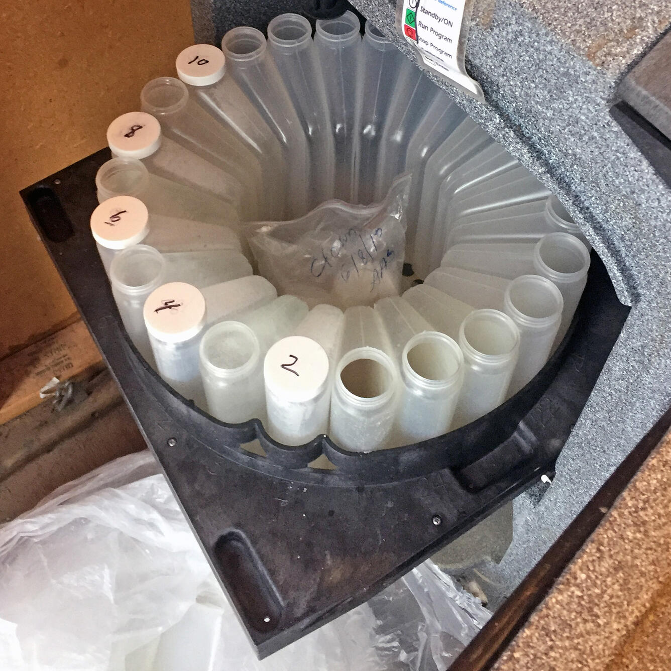 Tray of sample bottles in an automated sampling device | U.S ...